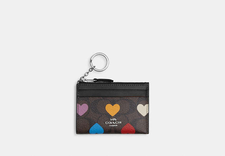 Coach Outlet Mini Skinny Id Case In Signature Canvas With Heart Print ...