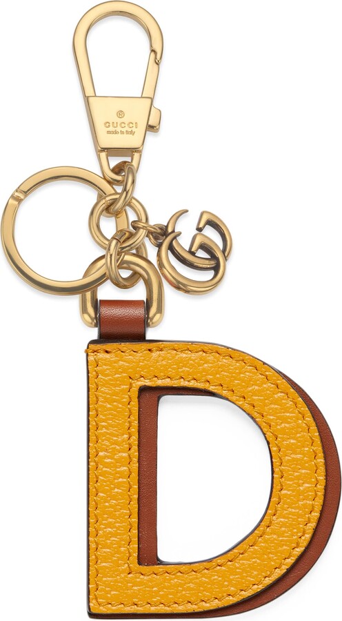 Gucci Letter D keychain - ShopStyle Wallets & Card Holders