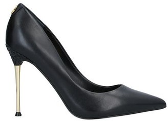 GUESS Pumps | Shop the world’s largest collection of fashion | ShopStyle