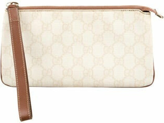 Gucci GG Signature Wristlet - ShopStyle Clutches