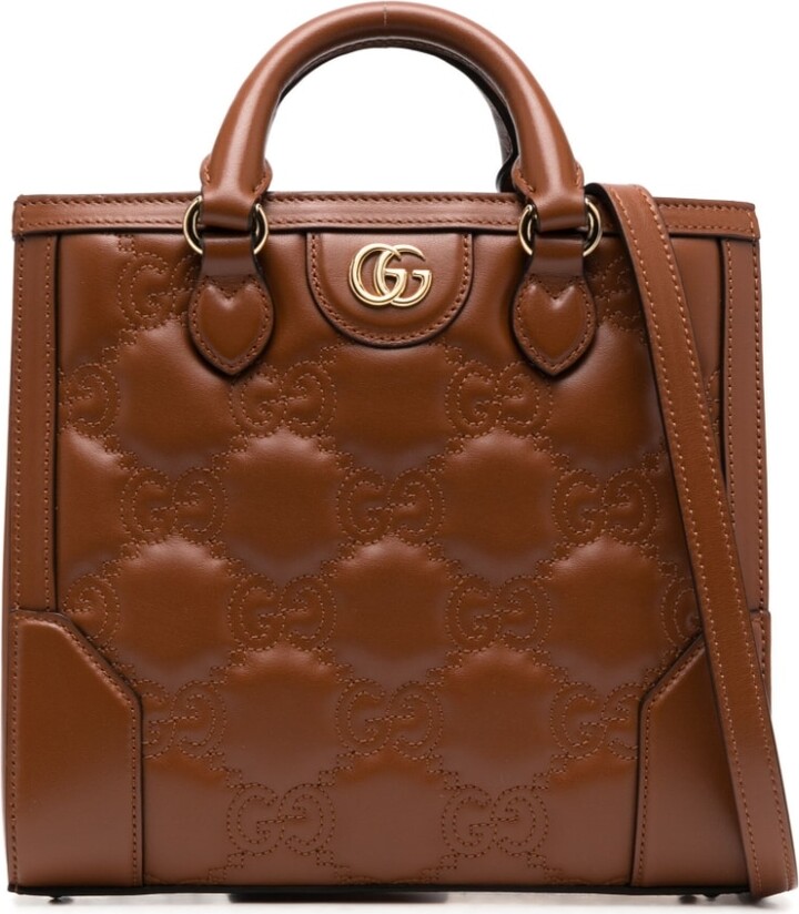 Gucci GG logo-embossed mini tote bag - ShopStyle