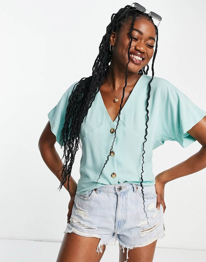 ASOS DESIGN flutter sleeve tea blouse with horn button in mint - ShopStyle