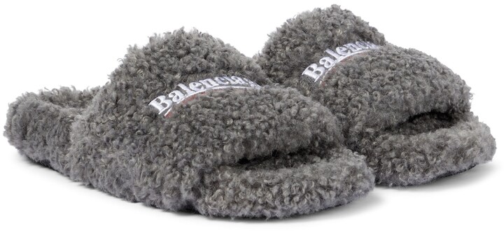 Balenciaga Logo faux shearling slides - ShopStyle