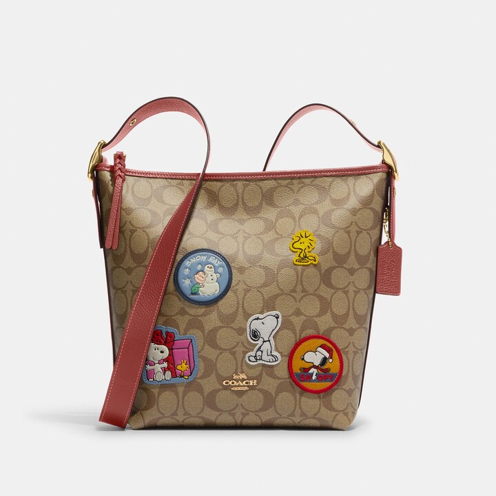 Coach Outlet Coach X Peanuts Val Duffle In Signature Canvas With ...