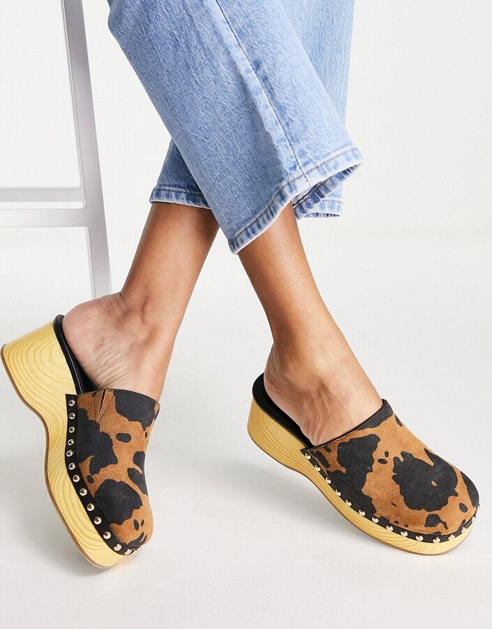 ASOS DESIGN Salvia flatform clog mules in cow print - ShopStyle