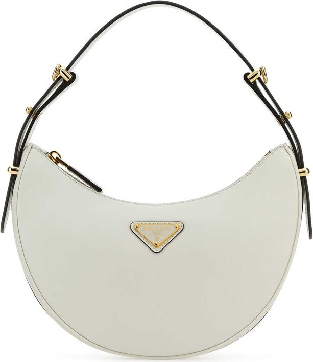 Prada Triangle Logo Plaque Moon Shaped Shoulder Bag - ShopStyle