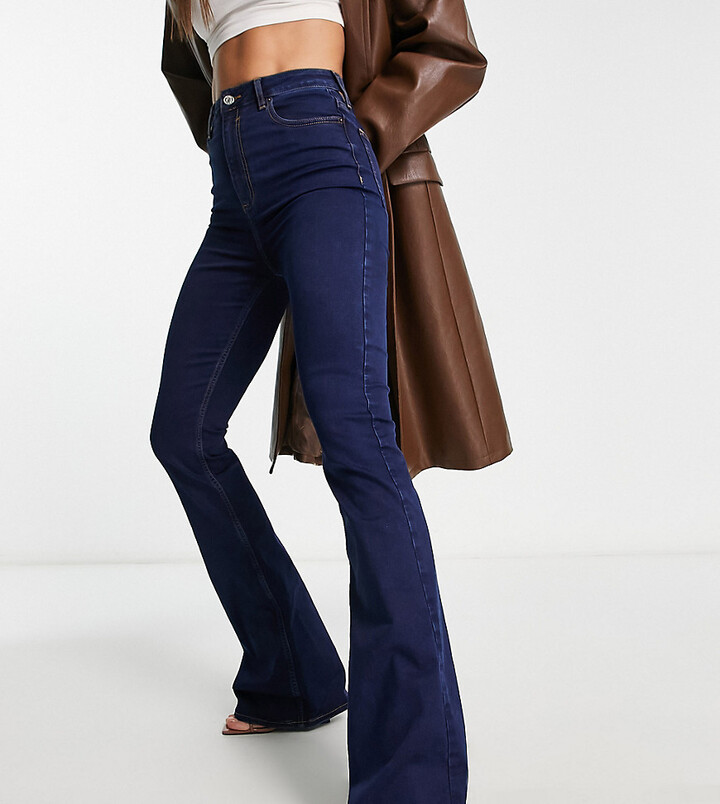 ASOS DESIGN Tall power stretch flared jeans in dark blue - ShopStyle