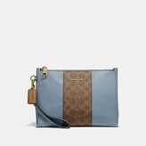 Coach Charlie Pouch With Signature Canvas Blocking - ShopStyle Clutches
