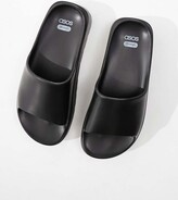 ASOS DESIGN Wide Fit Freedom cleated flatform slides in black - ShopStyle