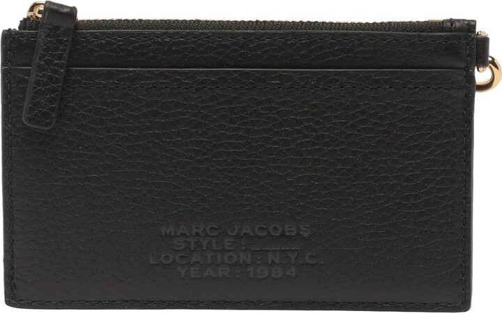 Marc Jacobs Logo Embossed Top-Zip Wristlet - ShopStyle Wallets & Card ...
