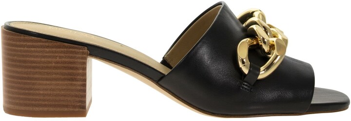 Michael Kors The Scarlett sabots will enhance any look. They are made ...