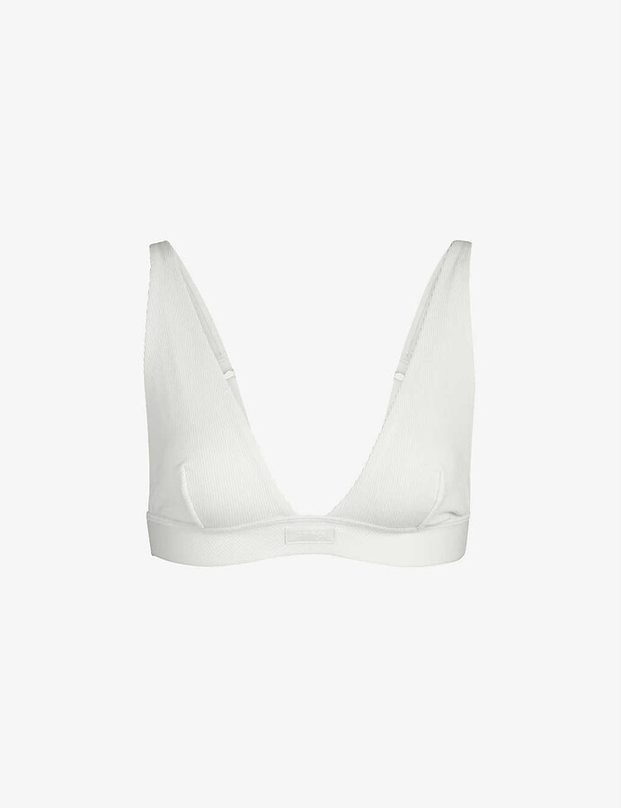 SKIMS Ribbed stretch-cotton bralette - ShopStyle Bras