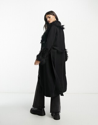 Violet Romance belted longline coat with faux fur trims in black - ShopStyle