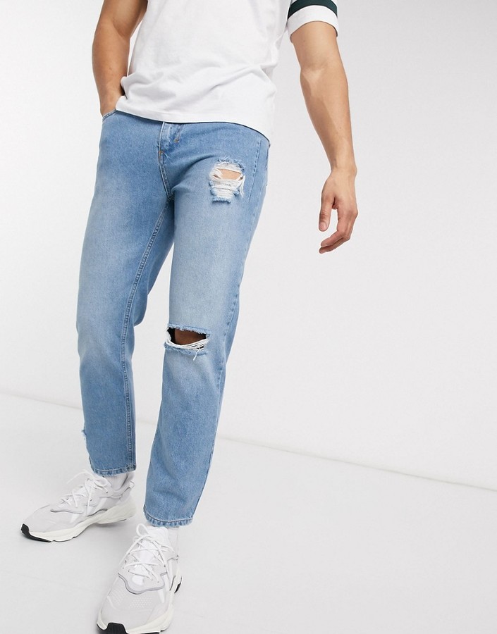 Religion Kick cropped fit jeans with knee rip in blue fade - ShopStyle