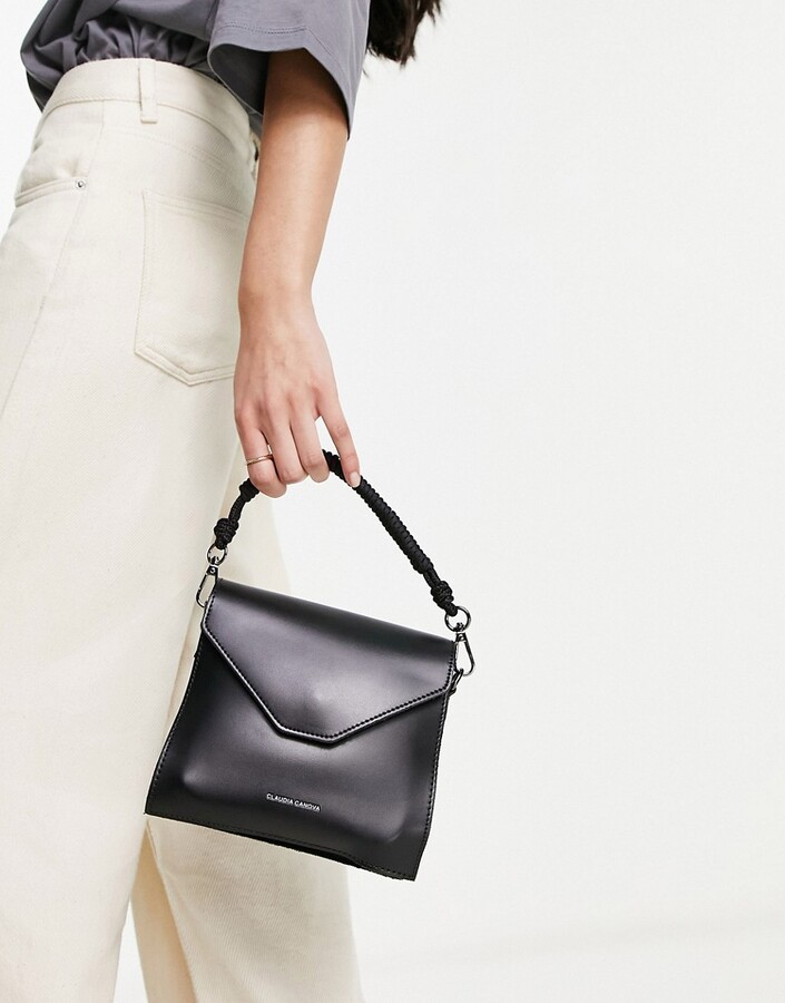 Claudia Canova angular flap top cross body bag with rope handle detail in black - ShopStyle