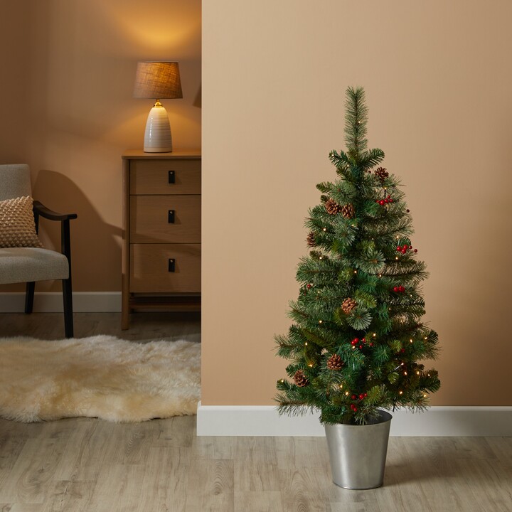 Dunelm 4ft Pre-Lit Berry & Cone Christmas Tree in Pot Green - ShopStyle