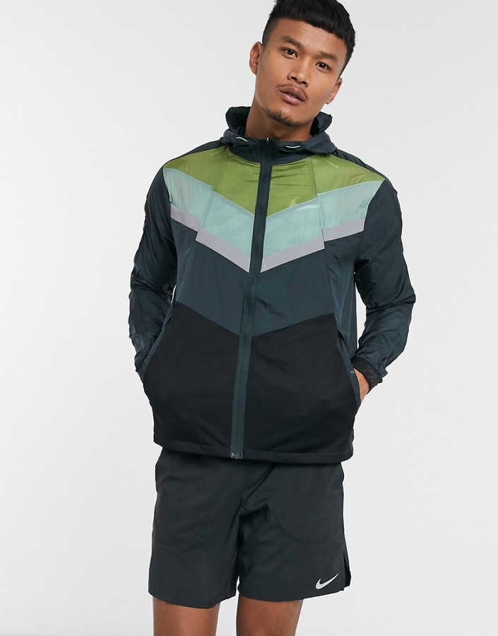 Nike Running wild run retro track jacket in blue - ShopStyle