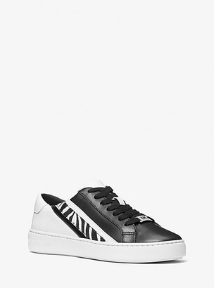 Michael Kors Pia Star Black Leather Slip On Trainer - ShopStyle