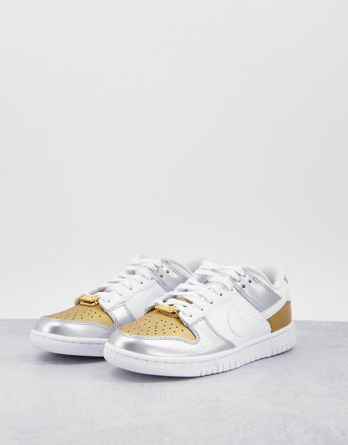 Nike Dunk Low SE sneakers in gold/silver - GOLD - ShopStyle
