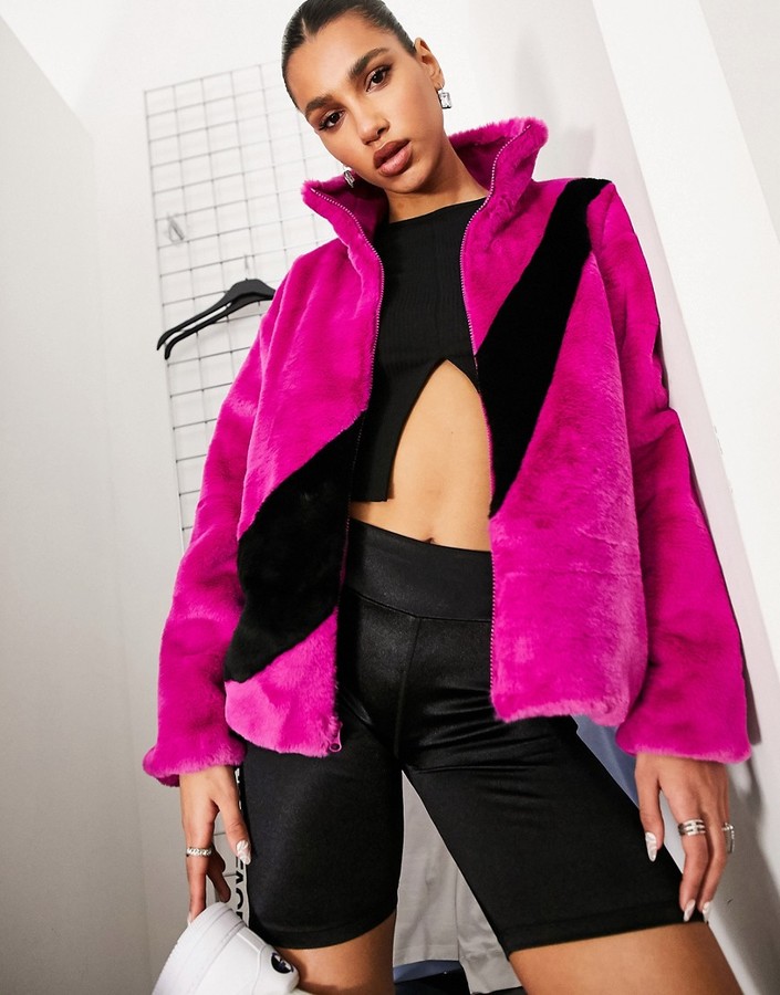 Nike faux fur oversized swoosh jacket in purple - ShopStyle