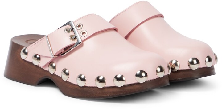 Ganni Buckled leather clogs - ShopStyle