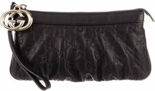 Gucci GG Signature Wristlet - ShopStyle Clutches