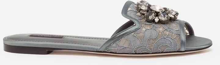 Dolce & Gabbana Slippers in lace with crystals - ShopStyle Mules & Clogs