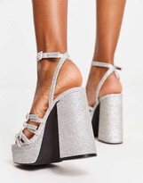 London Rebel mega platform strappy heeled sandals in silver glitter ...