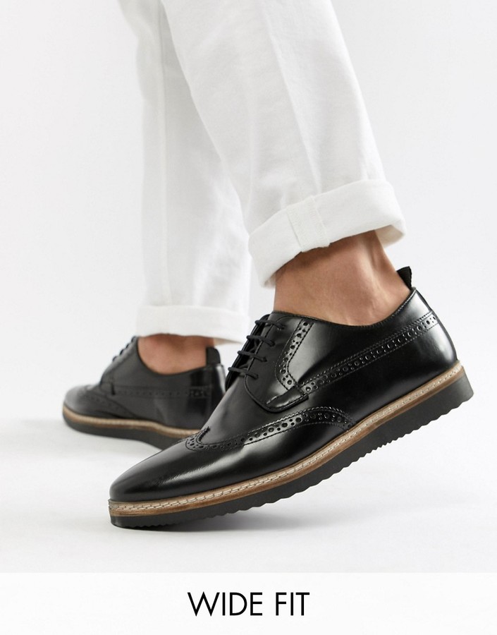 ASOS DESIGN Wide fit brogue shoes in black leather with wedge sole ...