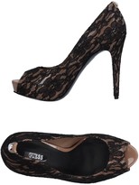 GUESS Pumps - ShopStyle