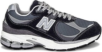 New Balance M2002RV1 in Black - ShopStyle Performance Sneakers