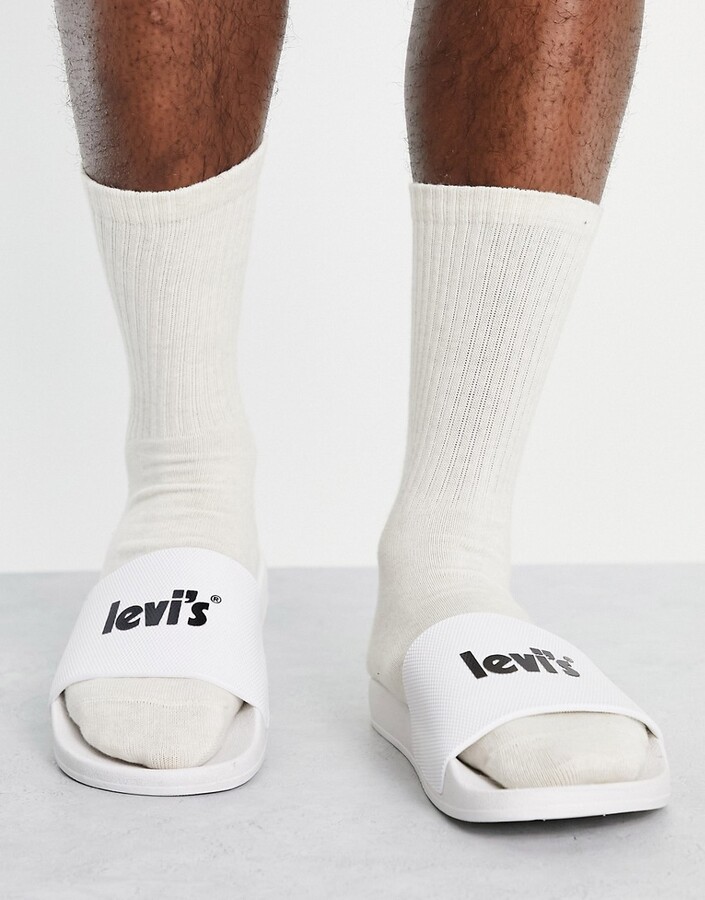 Levi's sliders with poster logo in white - ShopStyle Sandals & Slides