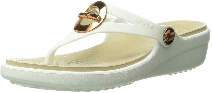 Crocs Women's Sanrah Circle Bow Wedge Flip W Dress Sandal - ShopStyle