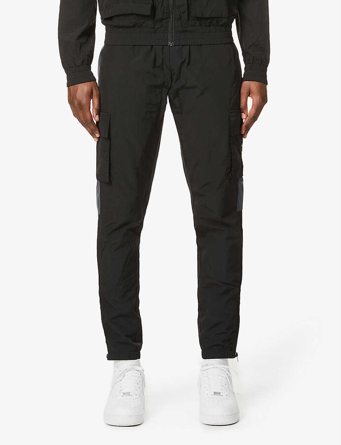 Trapstar Utility branded relaxed-fit shell jogging bottoms - ShopStyle ...