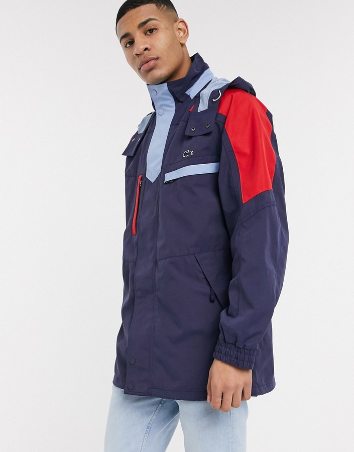 Lacoste hooded rain jacket - ShopStyle Outerwear