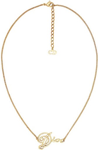 Christian Dior Cursive Logo Necklace in Metallic Gold - ShopStyle