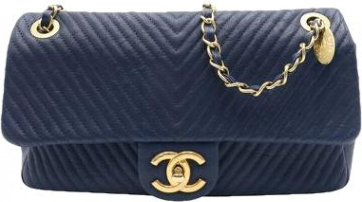 Chanel Leather handbag - ShopStyle Shoulder Bags