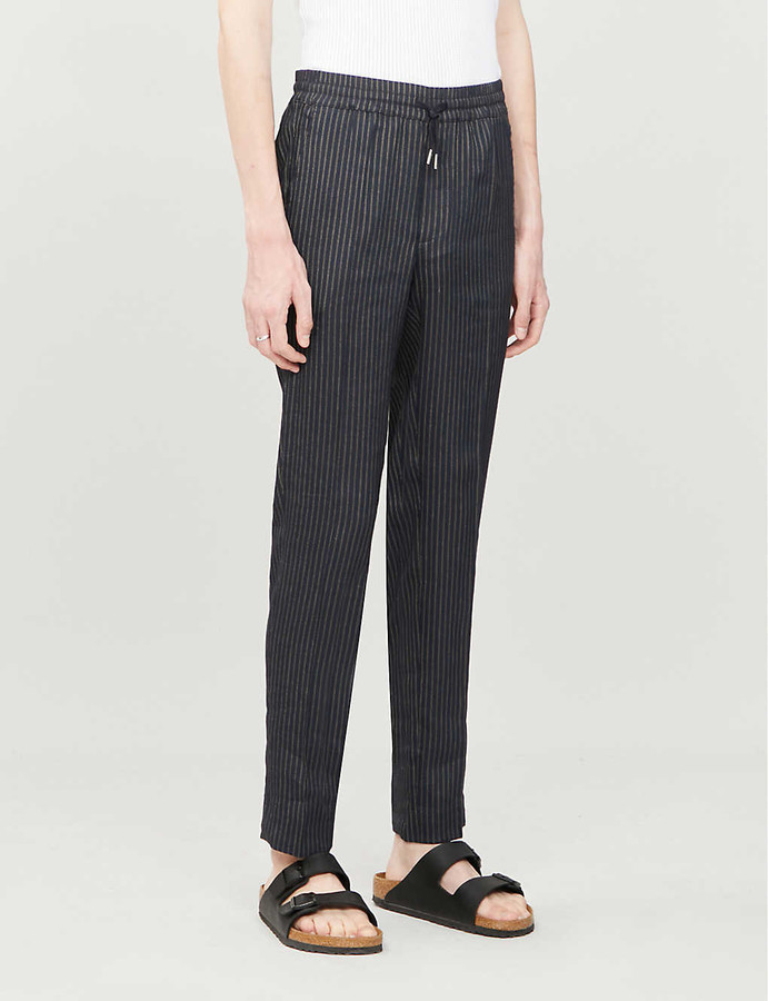 Sandro Alpha linen-blend tapered-leg trousers - ShopStyle Pants