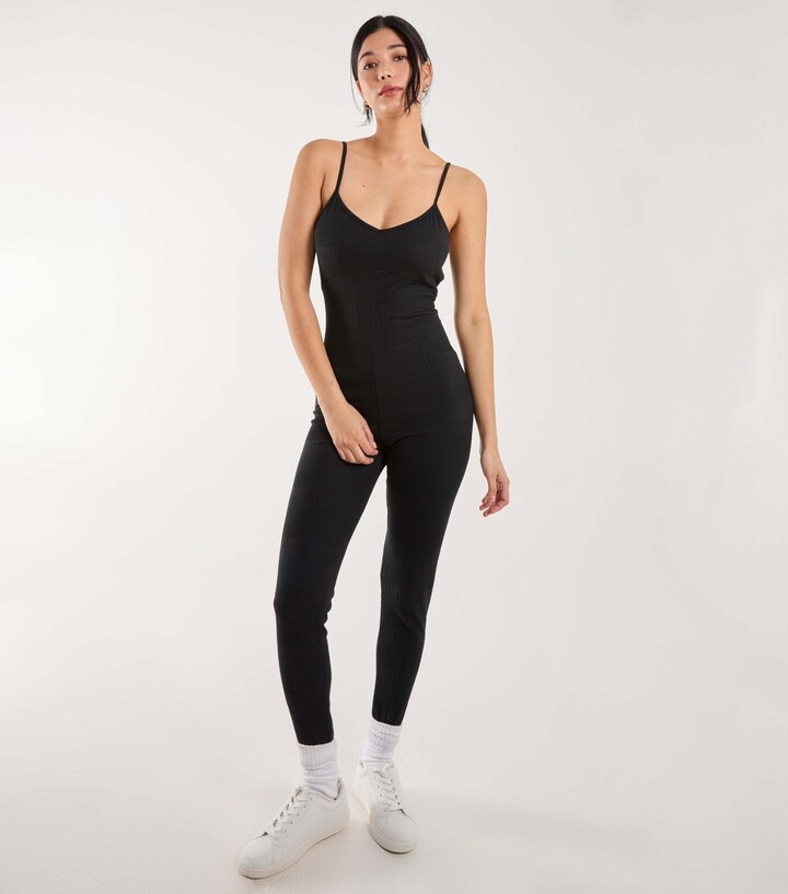 Women's Black Ribbed Strappy Unitard Pink Vanilla - ShopStyle Jumpsuits ...