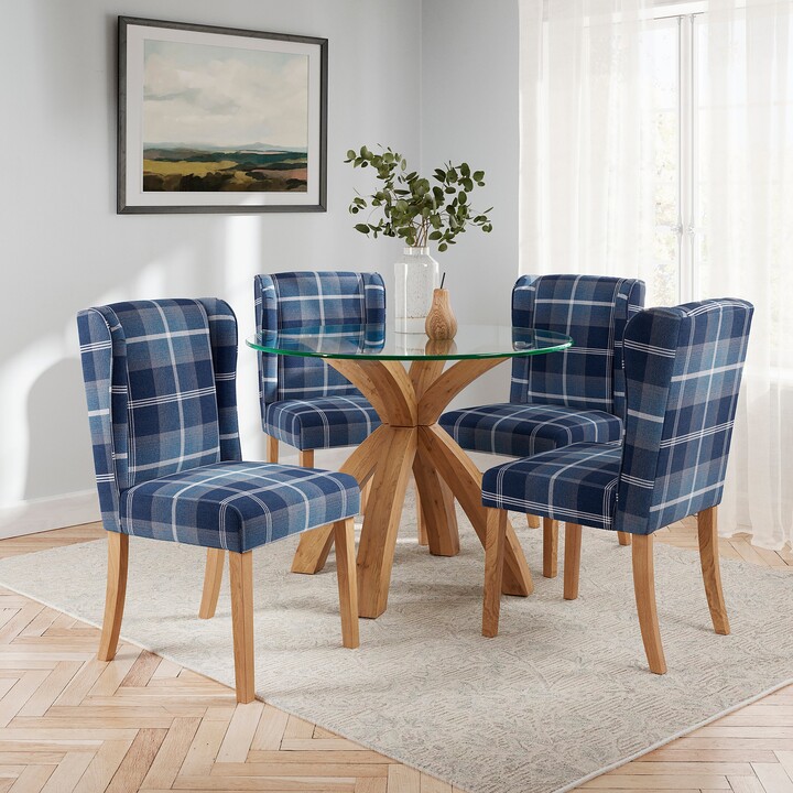 Dunelm Xavi Round Dining Table with 4 Oswald Navy Country Check Dining ...