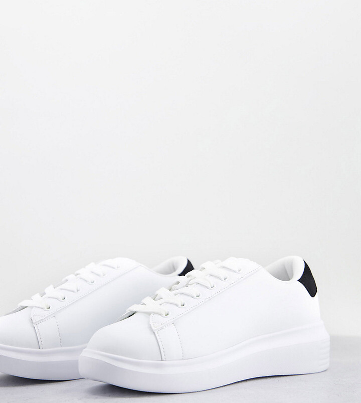 Truffle Collection wide fit chunky trainers in white with black tab - ShopStyle
