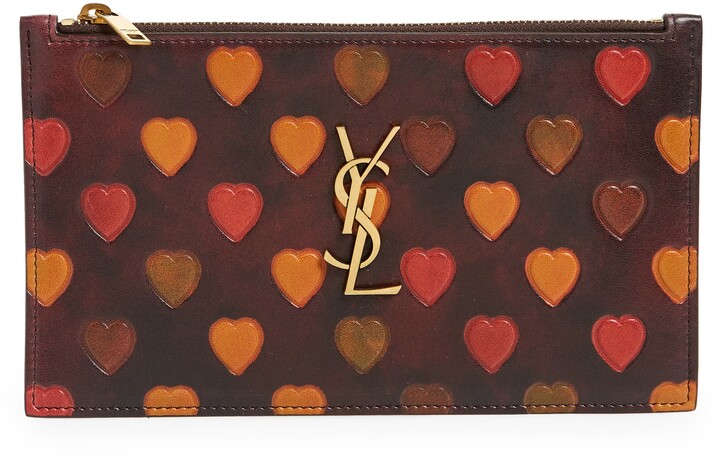 Saint Laurent Monogram Embossed Heart Leather Pouch - ShopStyle Clutches