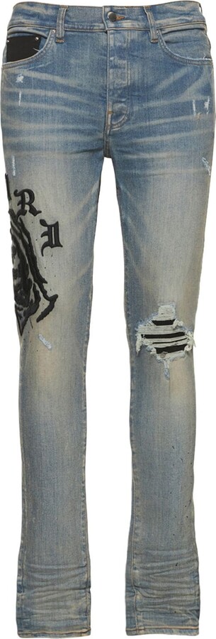 Amiri Wes Lang Reaper logo cotton denim jeans - ShopStyle