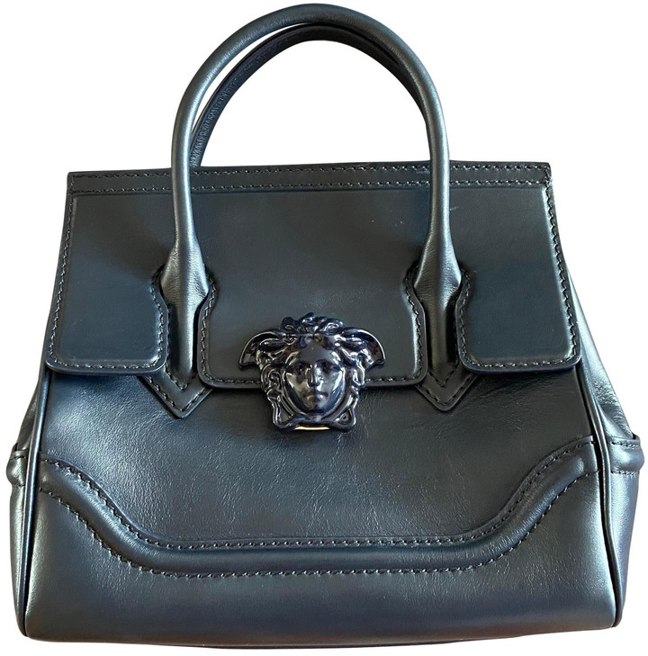 Versace navy Leather Handbags - ShopStyle Bags