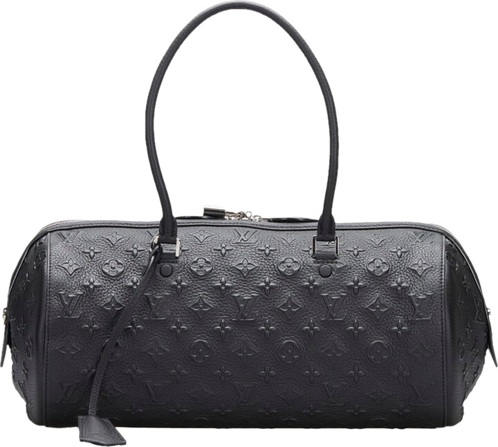 Louis Vuitton Papillon leather handbag - ShopStyle Tote Bags