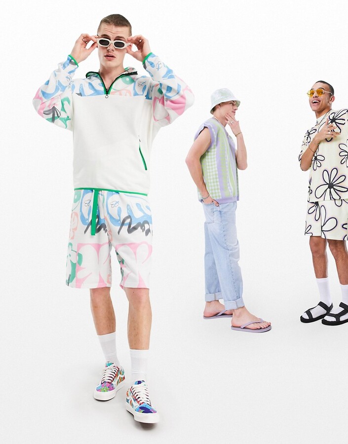 ASOS DESIGN set oversized shorts with graphic floral print & webbing ...