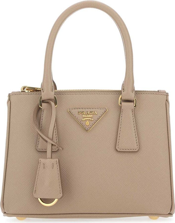 Prada Handbags. - ShopStyle Beach & Straw Bags