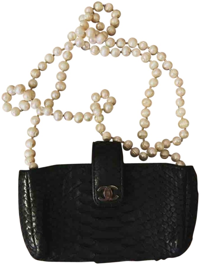 Chanel Black Python Clutch bags - ShopStyle